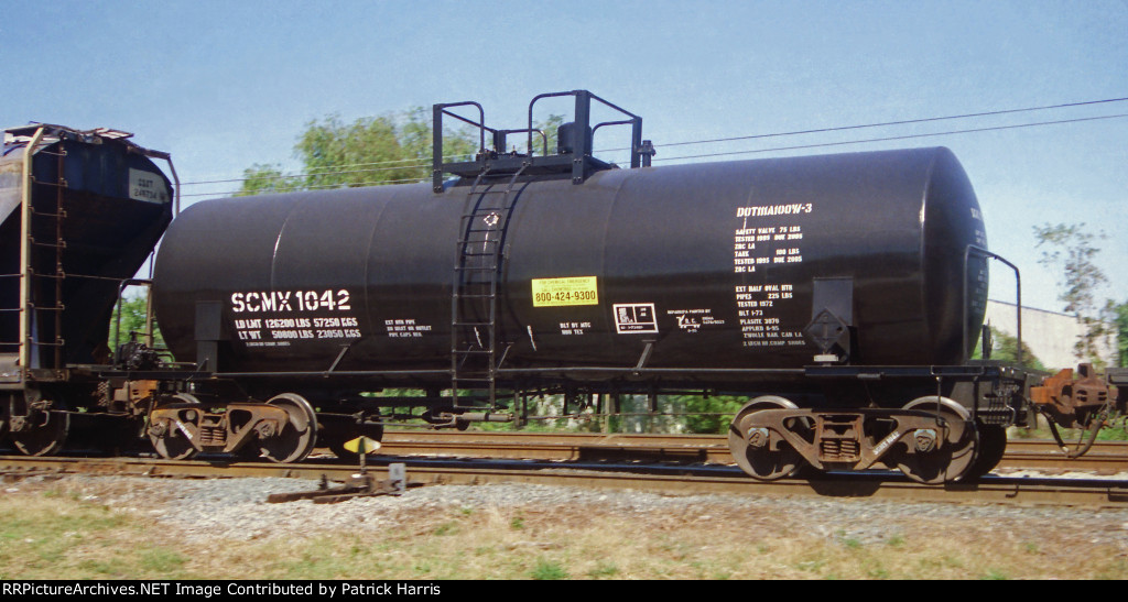 SCMX 1042 01-1973 built 08-1995 Zwolle Rail Car repainted MTC-built DOT 111A100W-3 tank car at ...